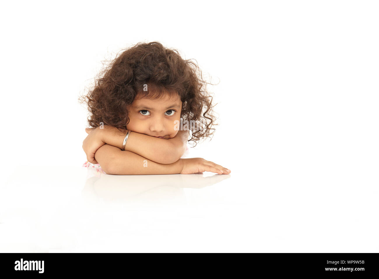 Resting head on arms Cut Out Stock Images & Pictures - Alamy