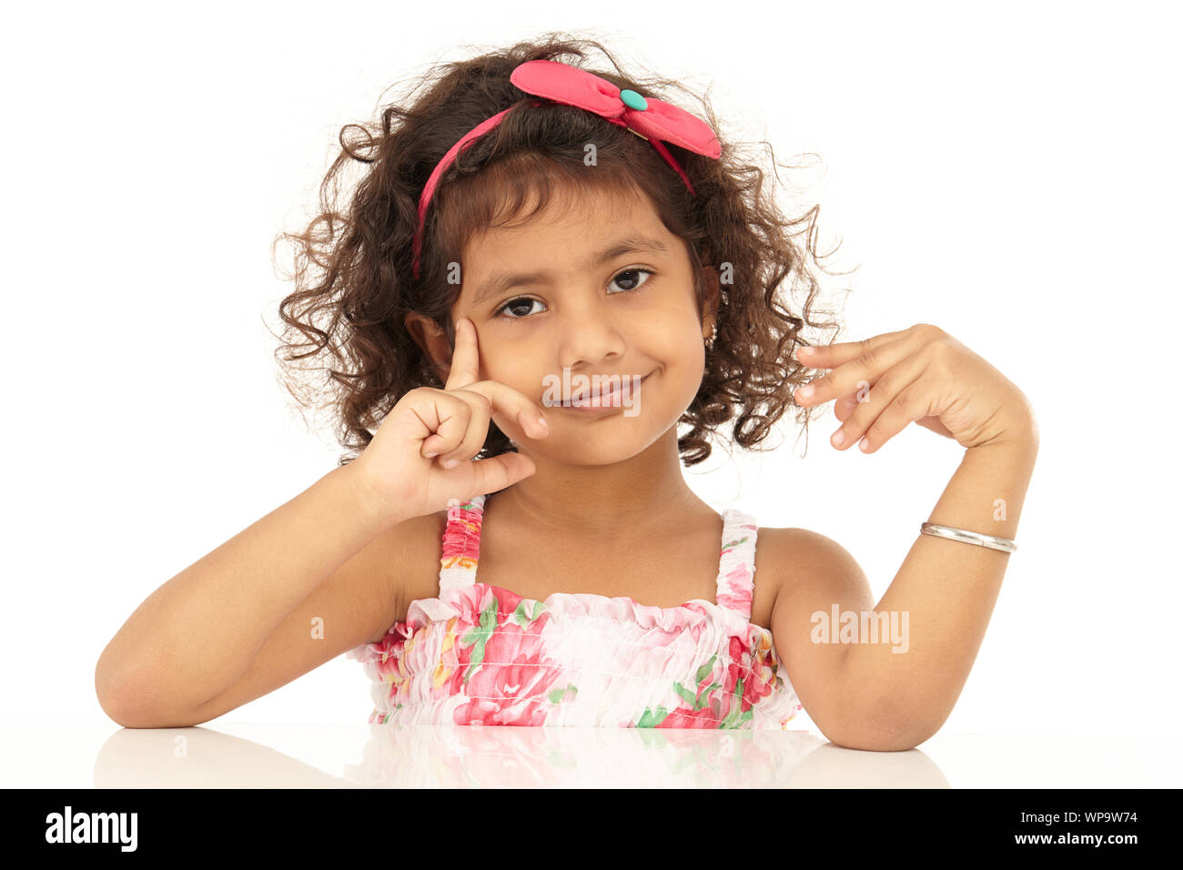 Portrait of a girl thinking Stock Photo - Alamy