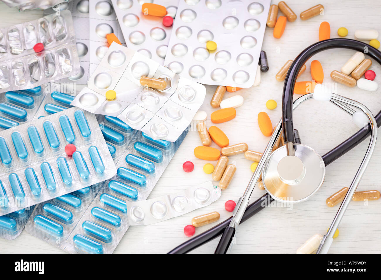 A large amount of medicine with a stethoscope on the doctor's desk ...
