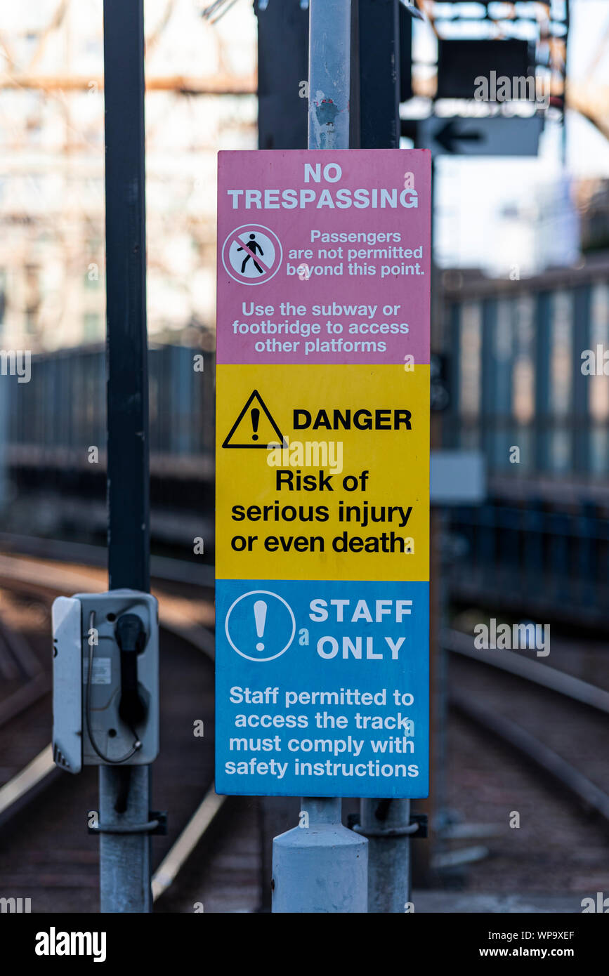 Warning signs at end of platform at Fenchurch Street station, London ...