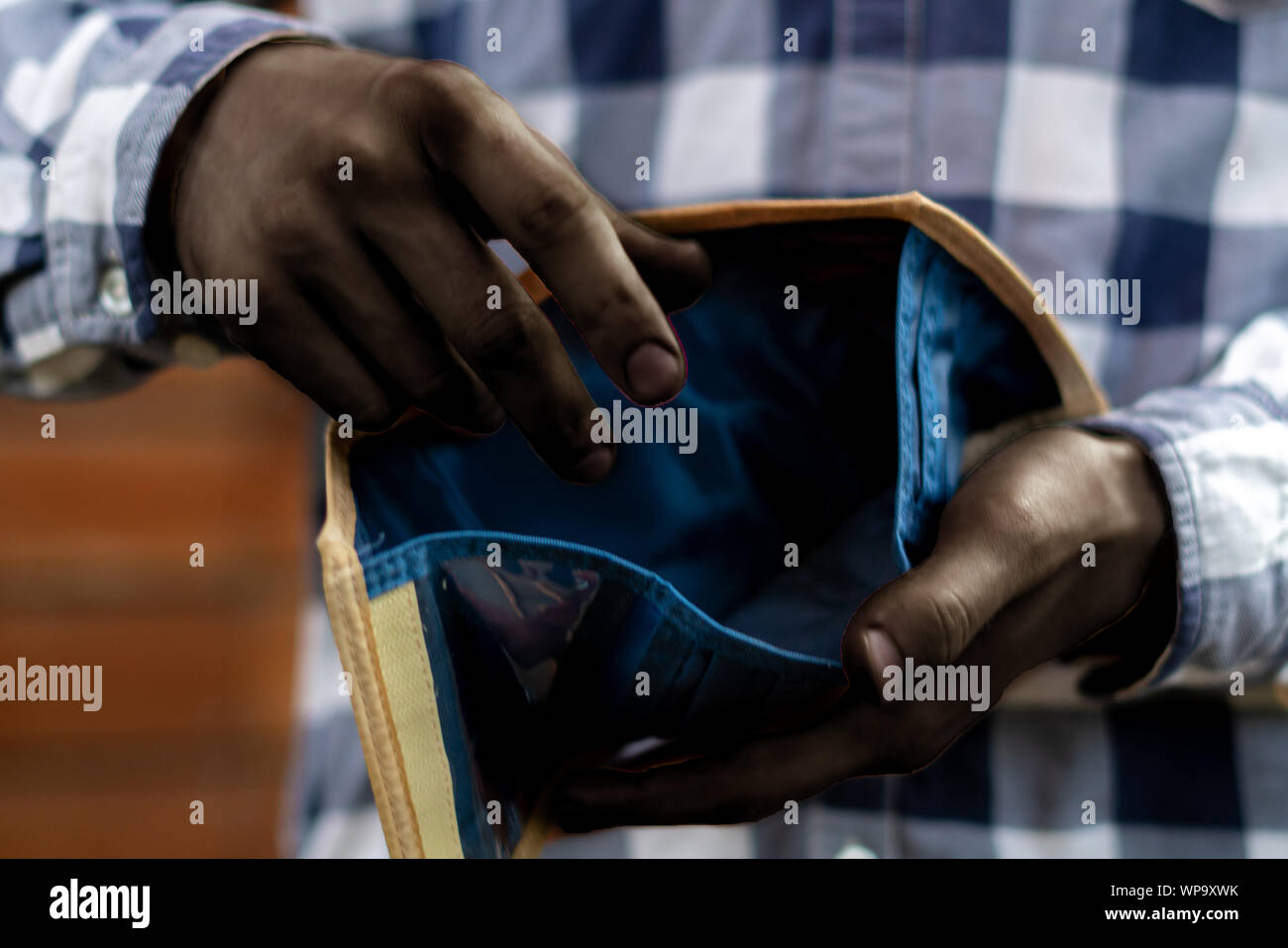 Poor person purse hi-res stock photography and images - Alamy