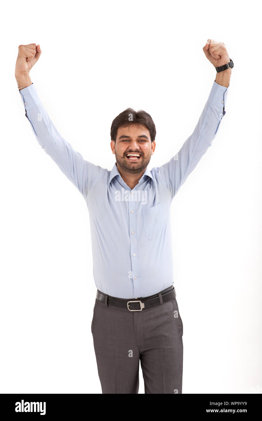 Young man celebrating his success Stock Photo - Alamy