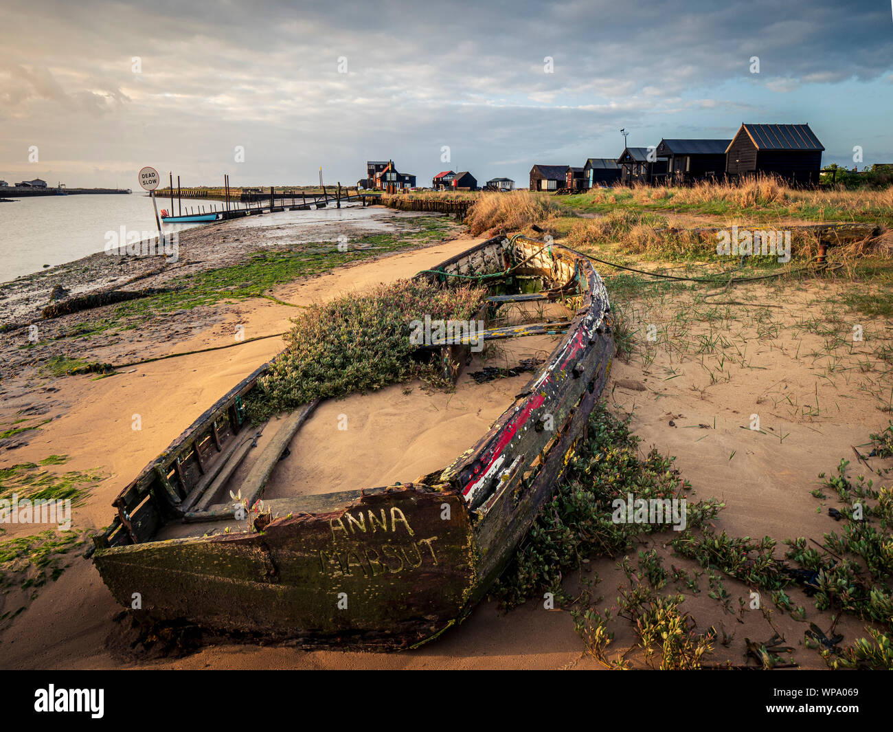 The wreck of a small wooden boat at Walberswick harbor Stock Photo - Alamy