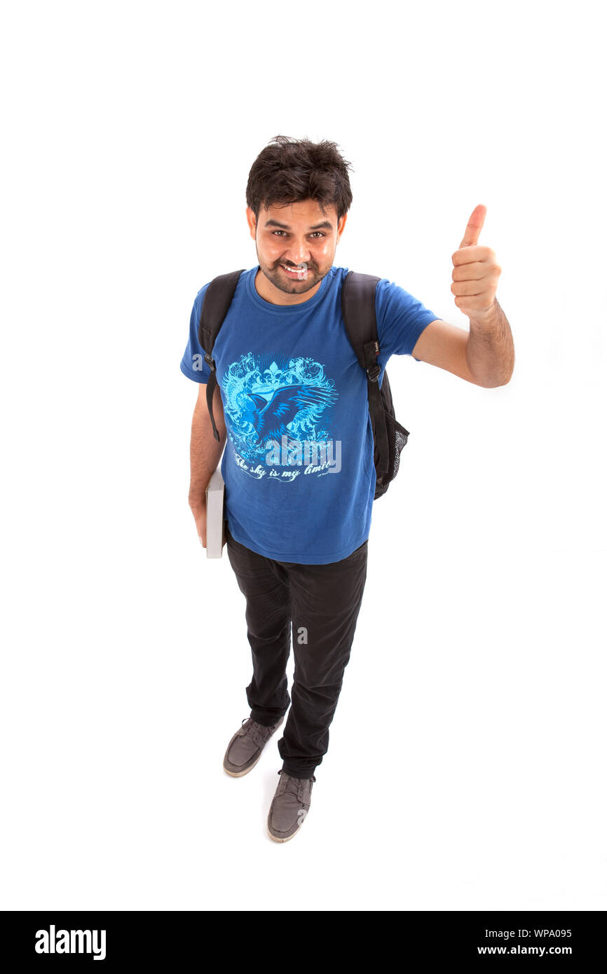 College student showing thumbs up sign Stock Photo - Alamy