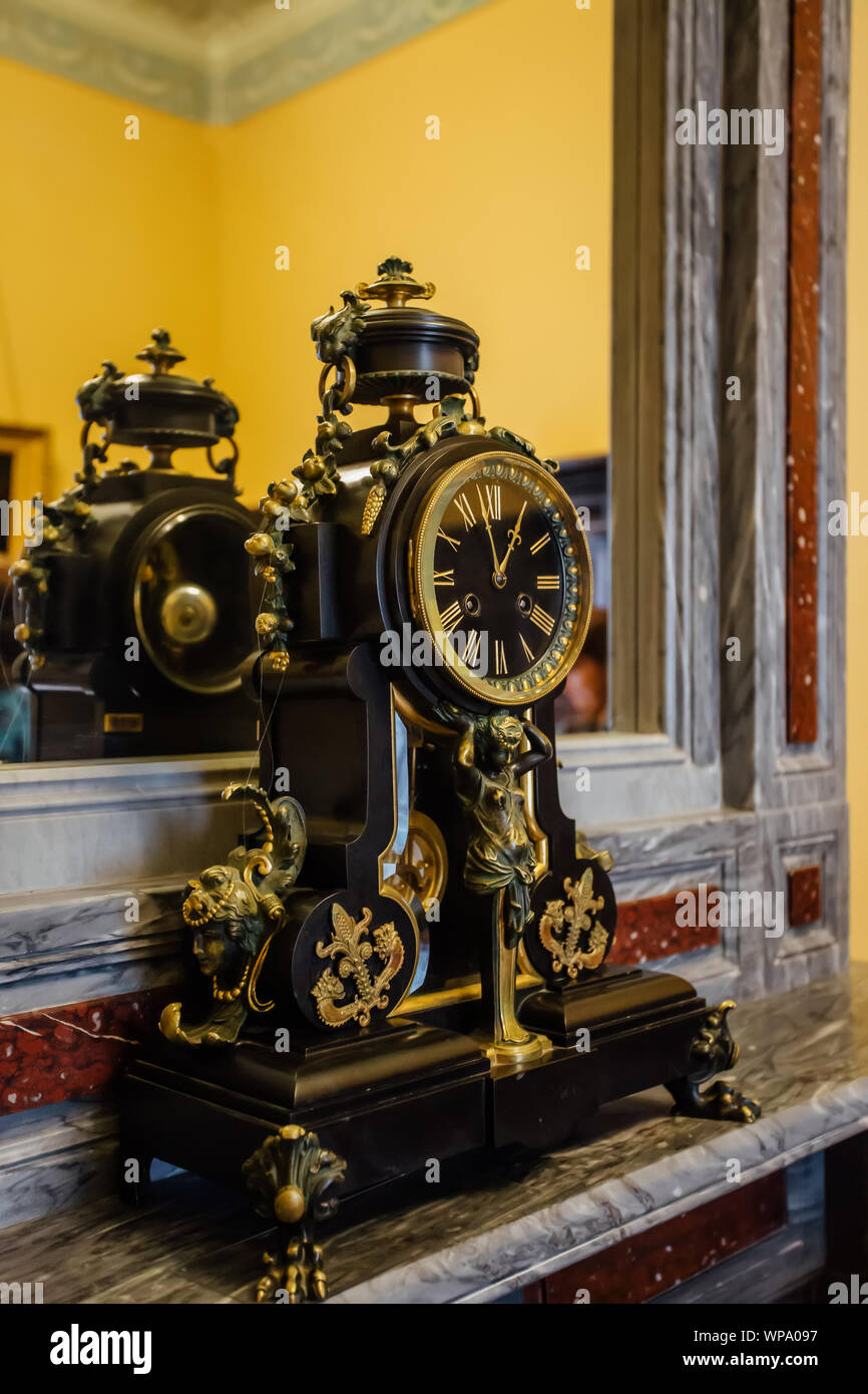 Old antique vintage classic clock in mansion Stock Photo - Alamy