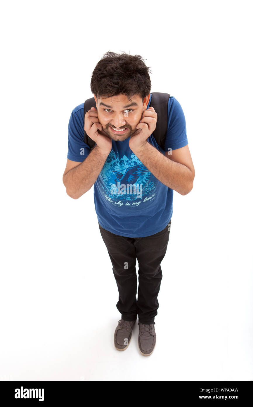 High angle view of a college student looking irritated Stock Photo - Alamy