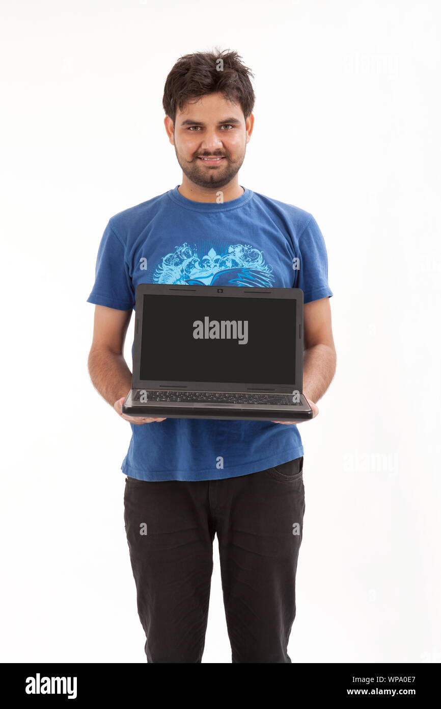 Salesman showing a laptop Stock Photo - Alamy
