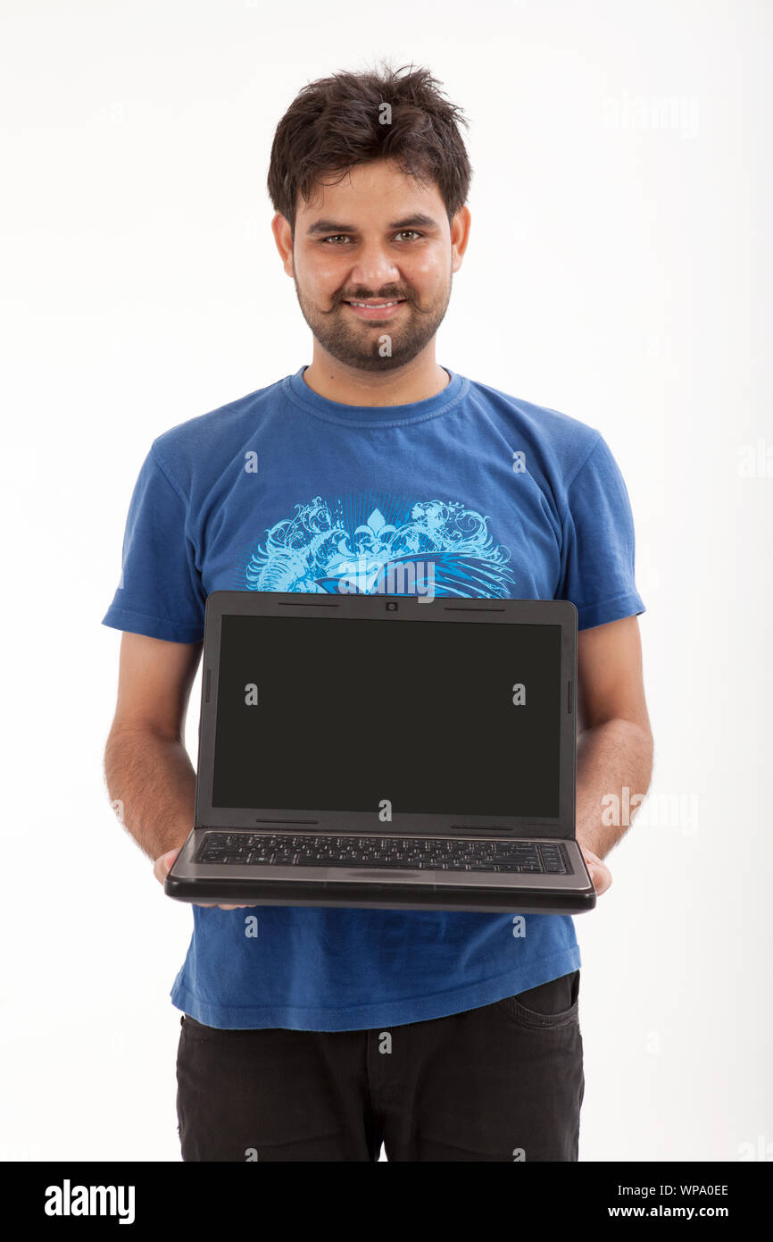 Salesman showing a laptop Stock Photo - Alamy
