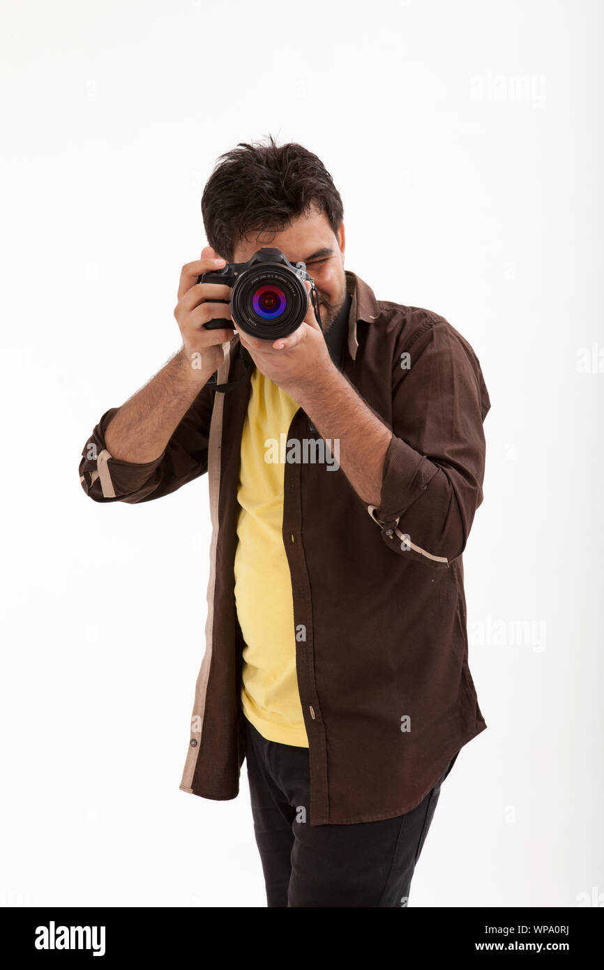 Photographer taking a picture Stock Photo - Alamy