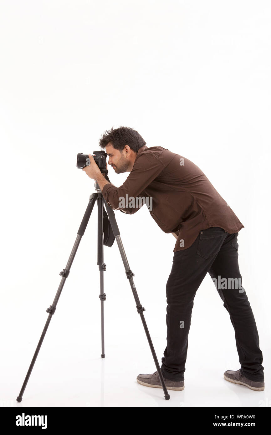 Photographer taking a shot Stock Photo - Alamy