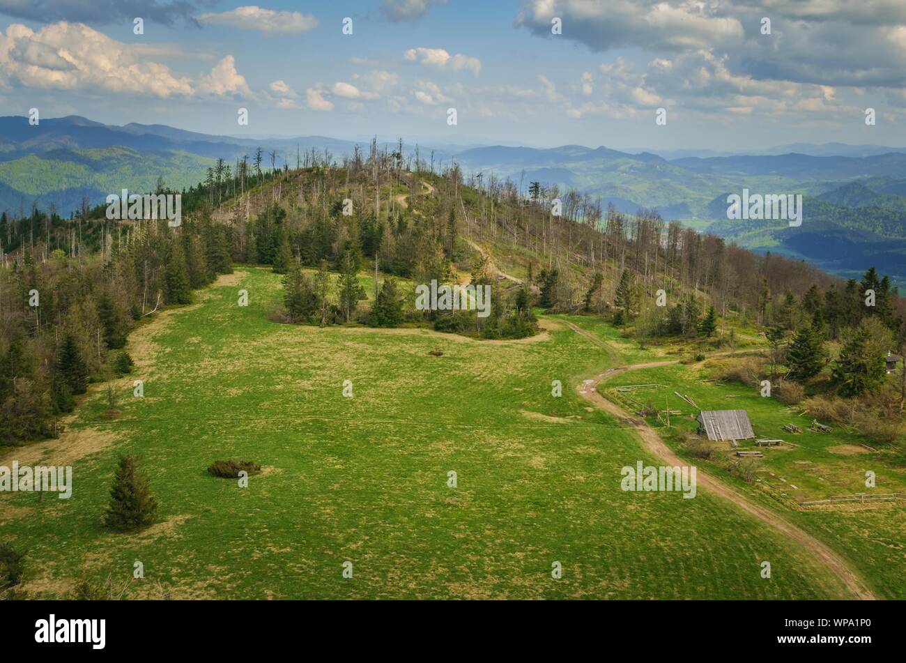 Beautiful rural mountain landscape. Empty campsite at the top of the ...