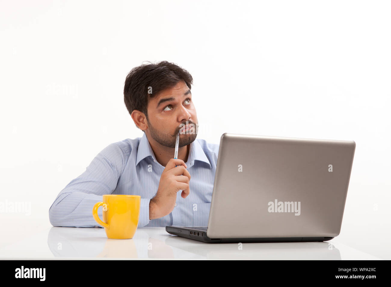 Working and thinking hi-res stock photography and images - Alamy
