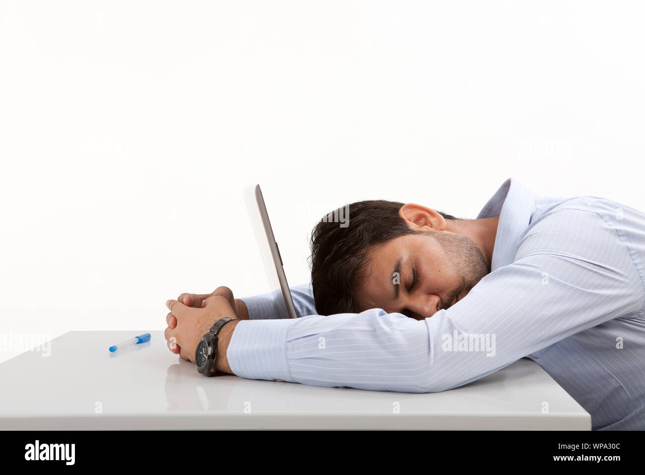 Businessman sleeping on laptop Stock Photo - Alamy