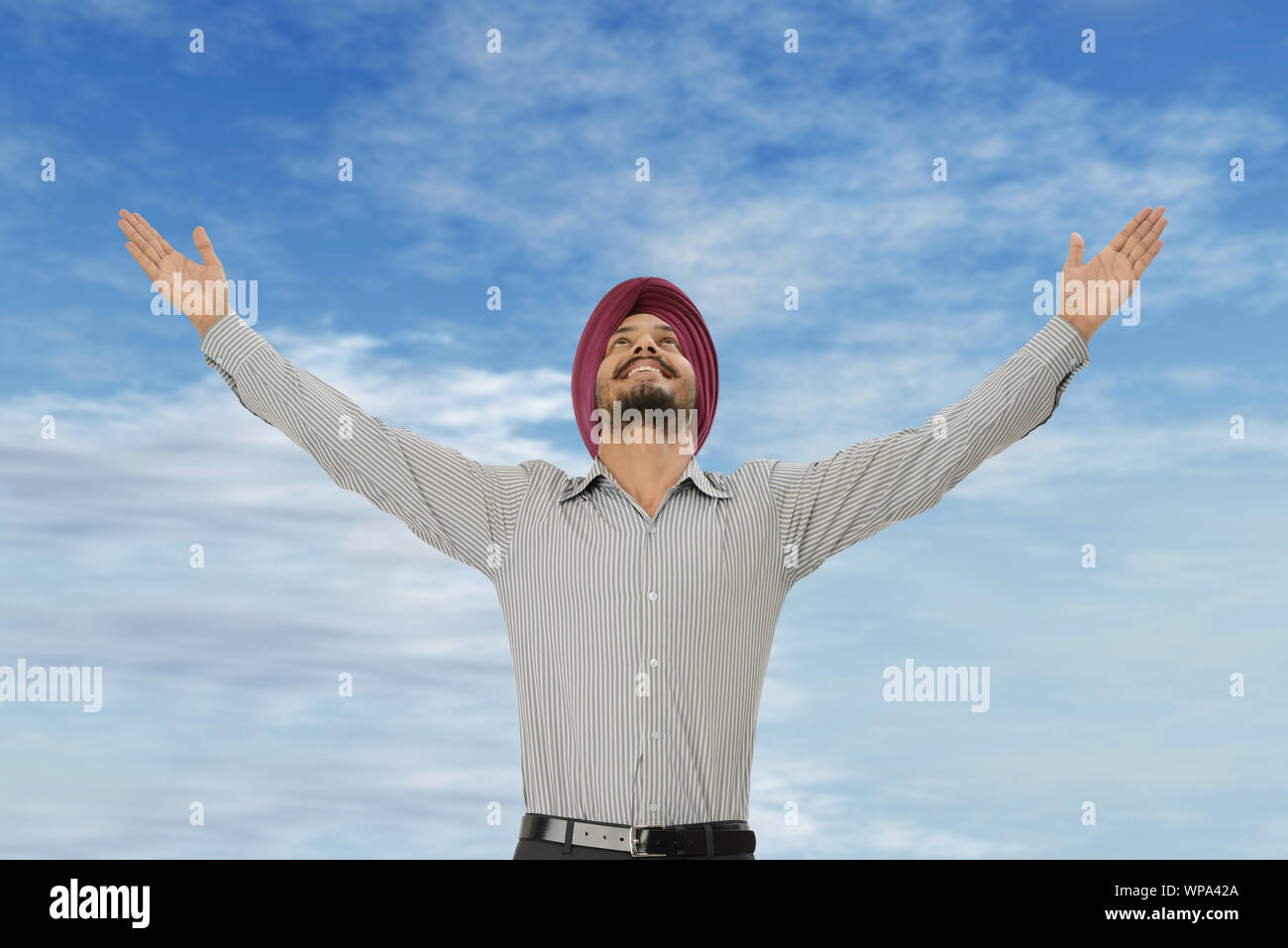 Man celebrating his success and smiling Stock Photo - Alamy