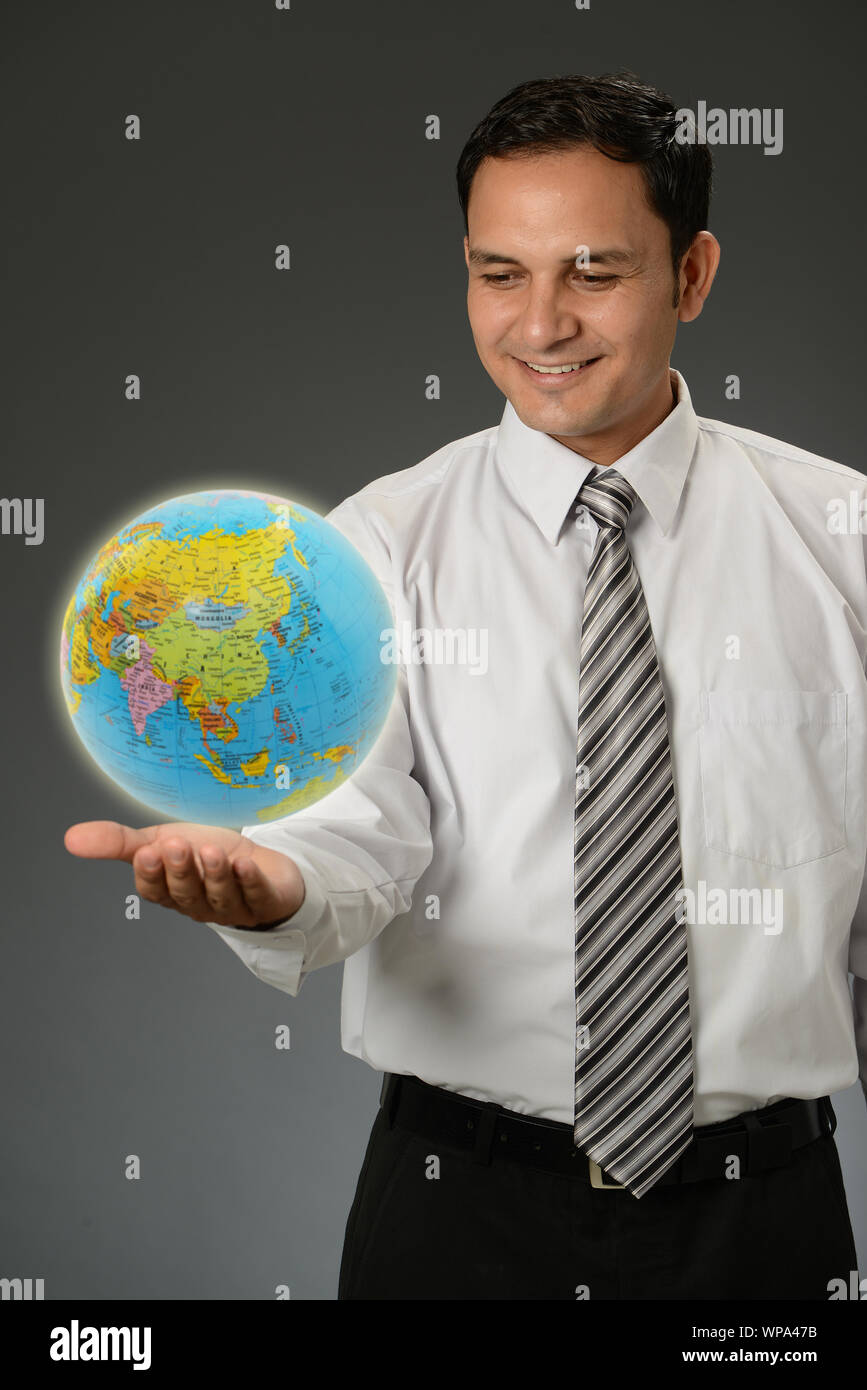 Asian man holding globe hi-res stock photography and images - Alamy Asian man holding globe hi-res stock photography and images - Alamy