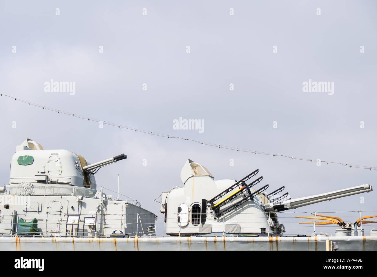 Navy warship with gunnery and missile Stock Photo - Alamy