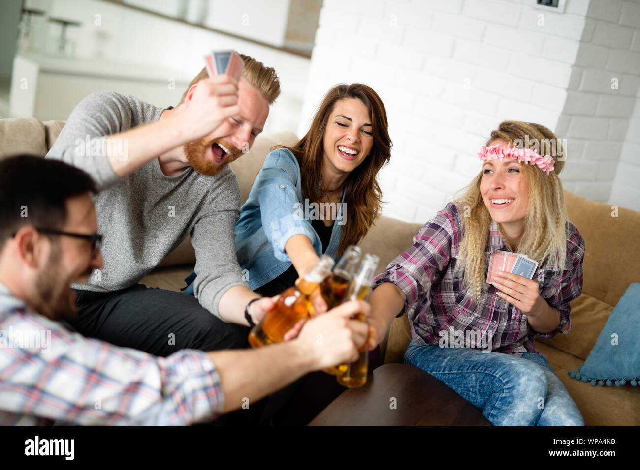 Group of friends relaxing, having fun and hanging out together Stock ...