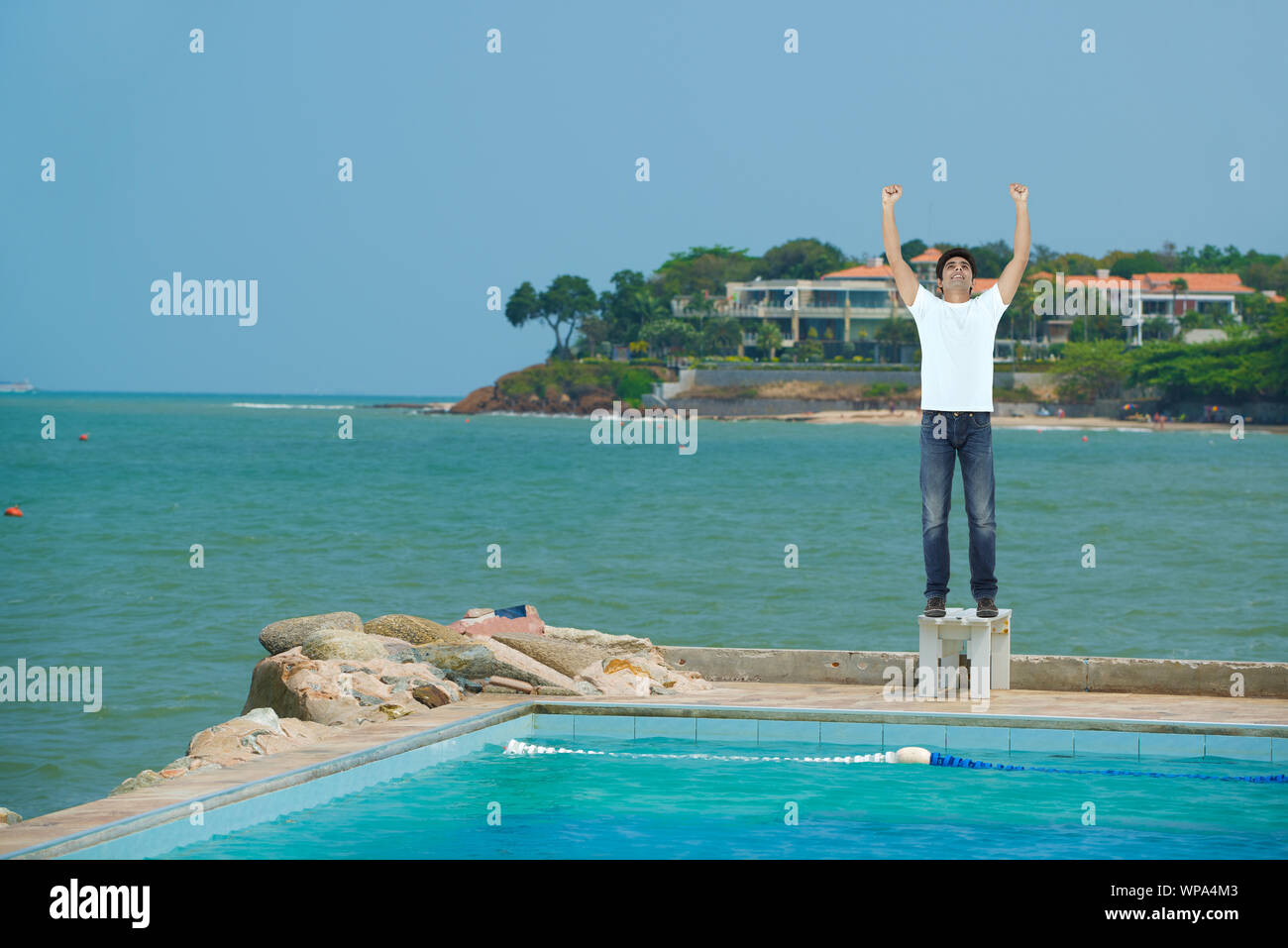 Young man celebrating his holiday Stock Photo - Alamy