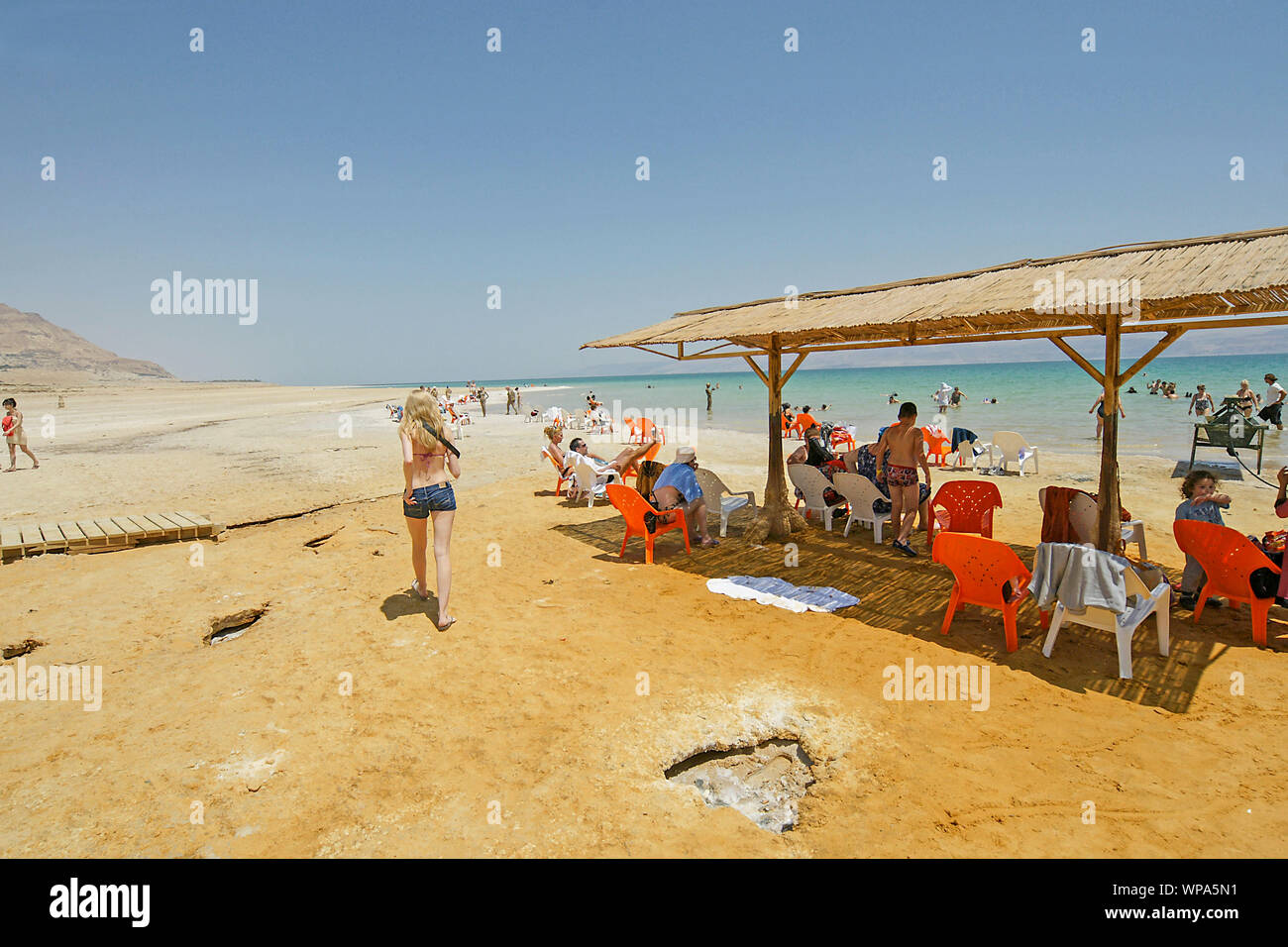 Tourist at the Ein Gedi Beach of the Dead Sea, Israel Stock Photo - Alamy