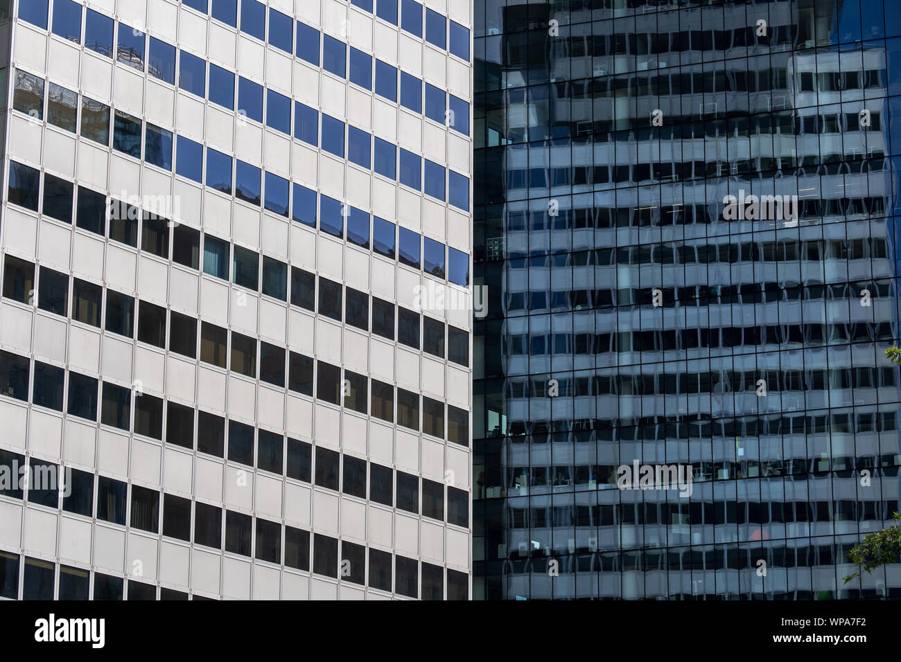 Abstract modern architecture background of two contrasting corporate ...