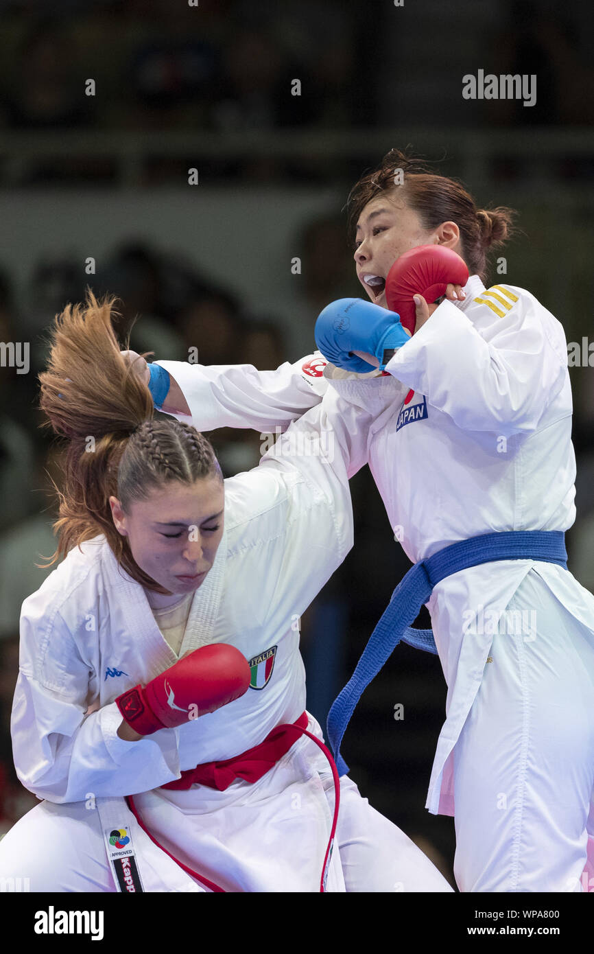 Tokyo, Japan. 8th Sep, 2019. Ayumi Uekusa of Japan (blue) fights ...