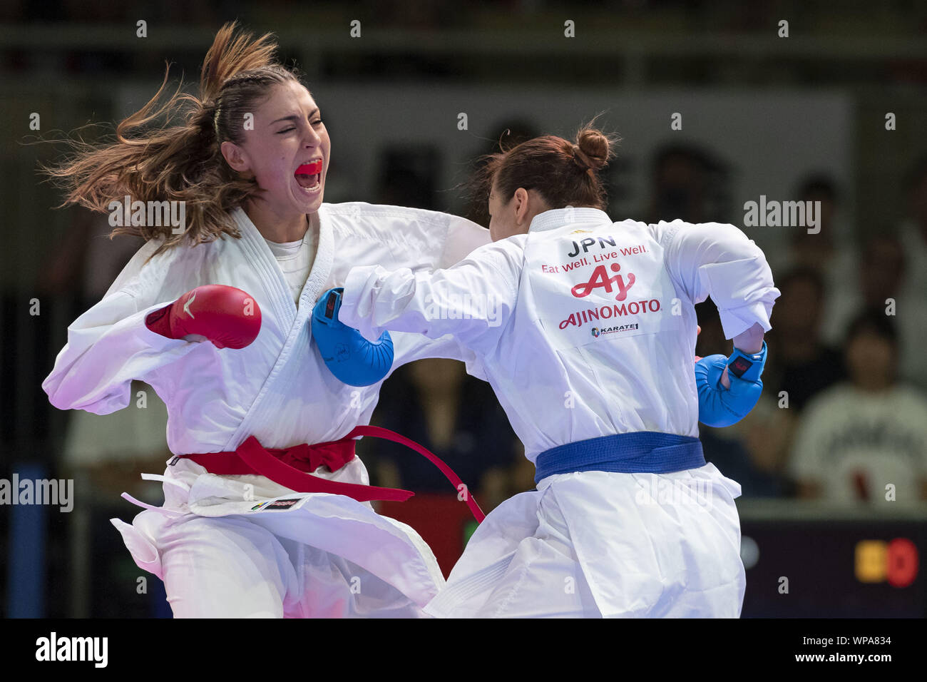 Tokyo, Japan. 8th Sep, 2019. Ayumi Uekusa of Japan (blue) fights ...