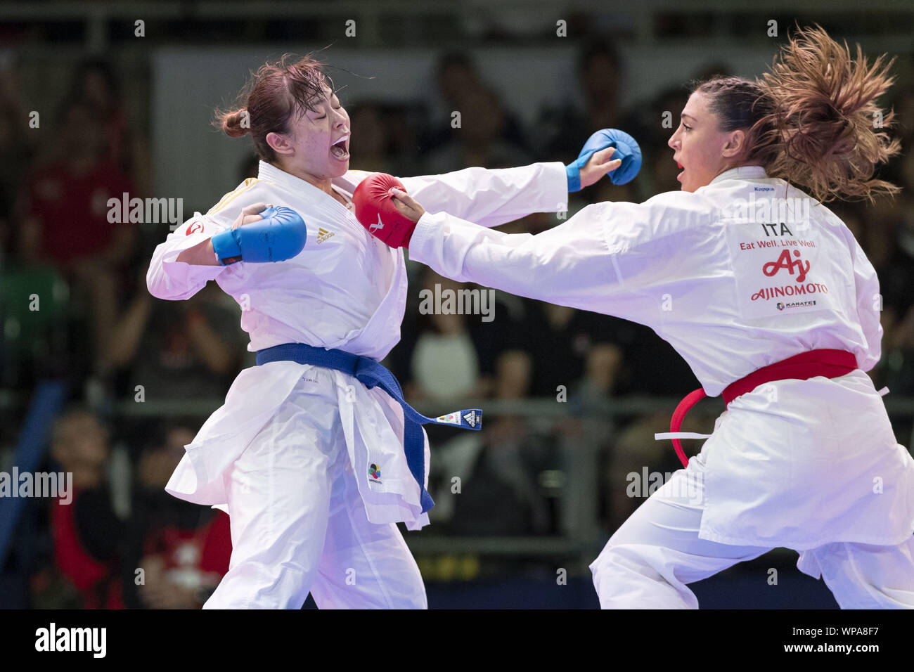 Tokyo, Japan. 8th Sep, 2019. Ayumi Uekusa of Japan (blue) fights ...