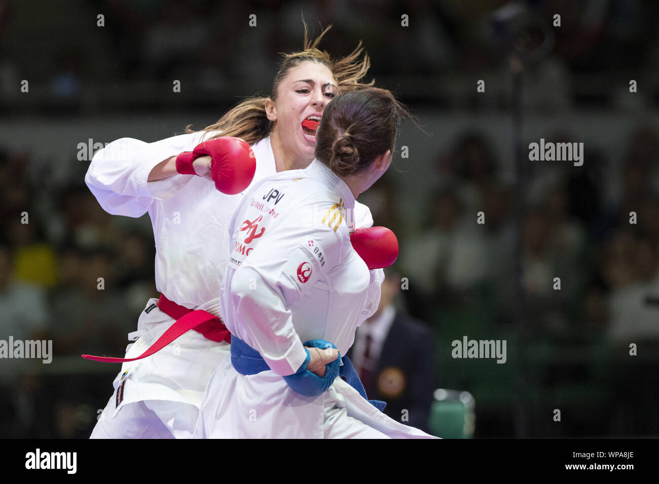 Tokyo, Japan. 8th Sep, 2019. Ayumi Uekusa of Japan (blue) fights ...