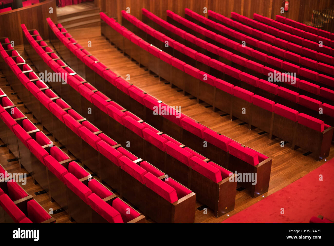 High angle image of rows of empty red seats in a conference room Stock ...