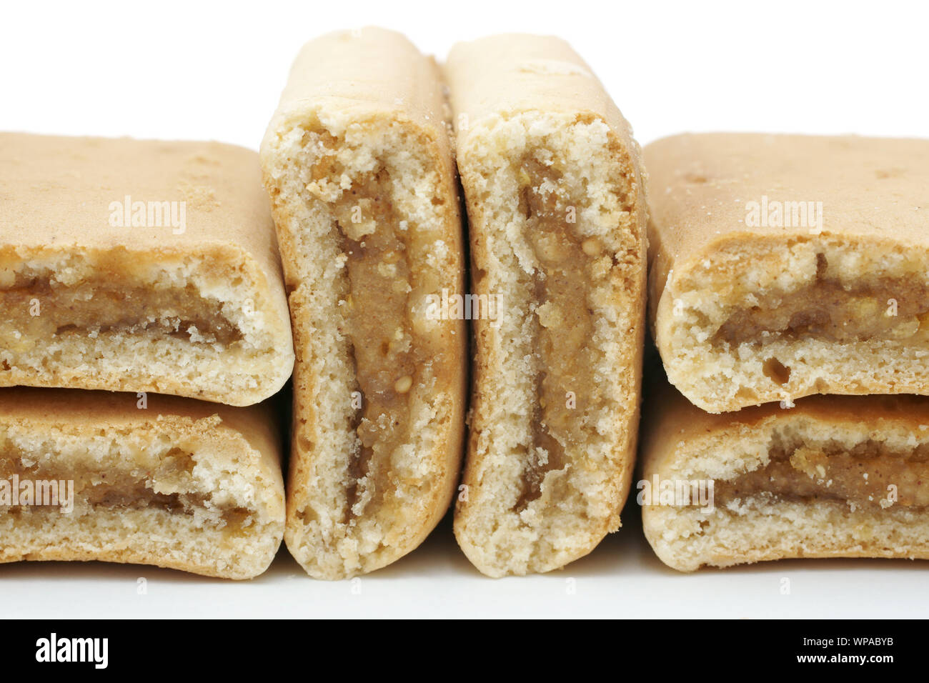 Apple date bars arranged to show the sweet filling inside. The bars are ...