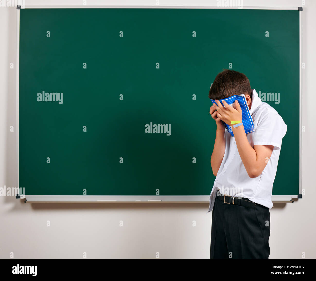 Portrait of funny pupil. School boy very emotional, having fun and very ...