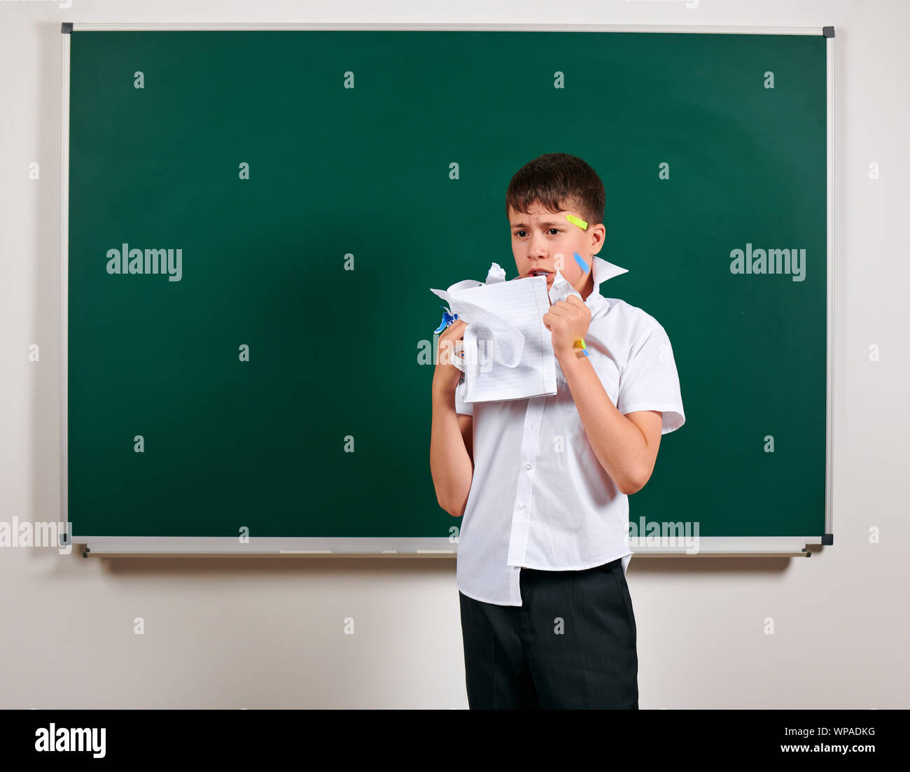 Portrait of funny pupil. School boy very emotional, having fun and very ...