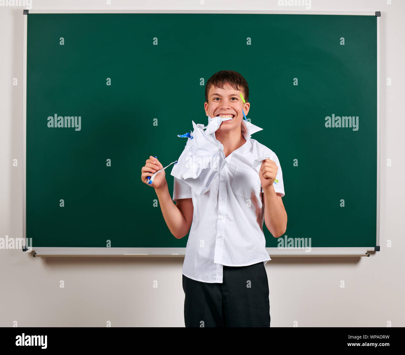 Portrait of funny pupil. School boy very emotional, having fun and very ...