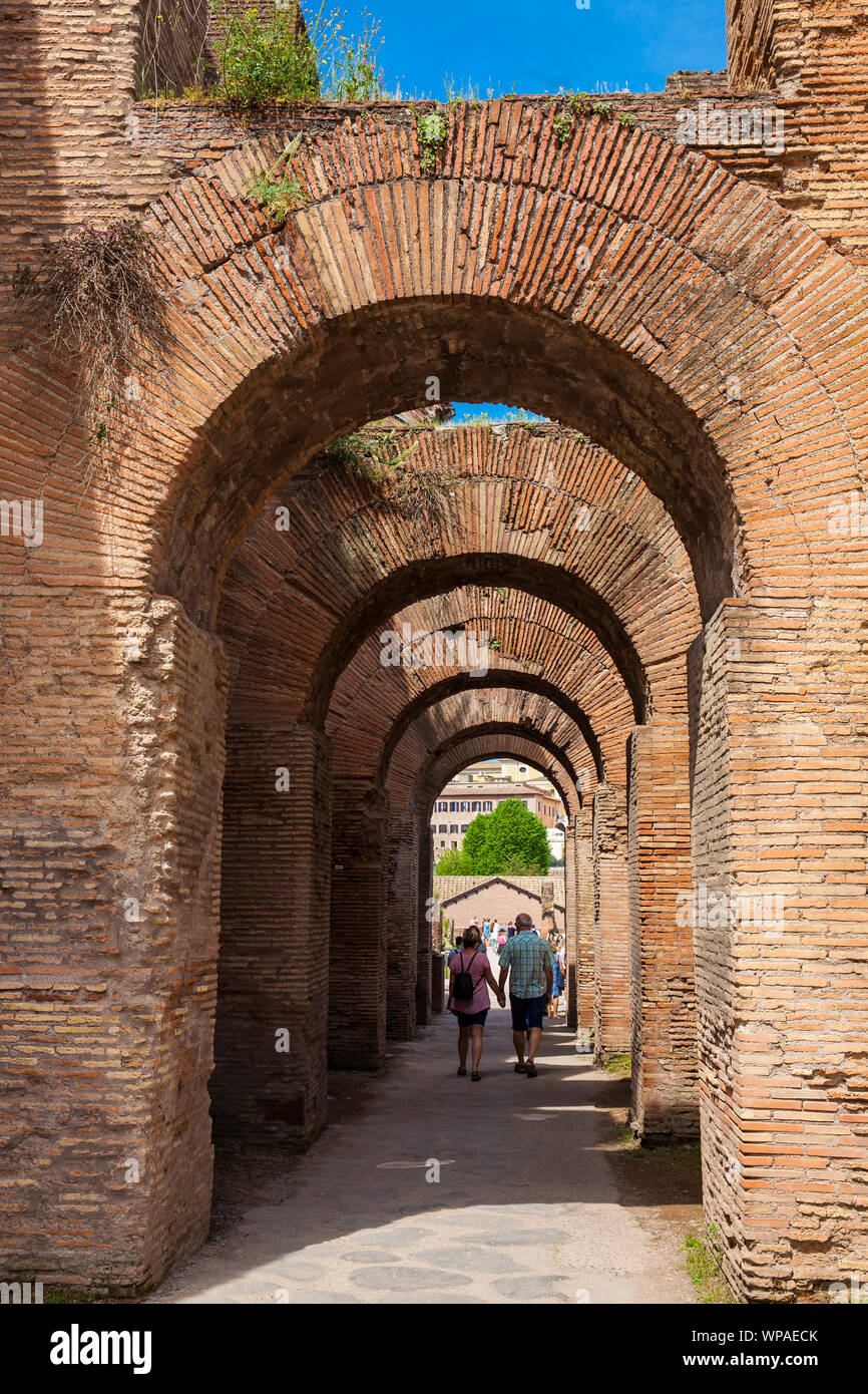 ROME, ITALY - APRIL, 2018: Tourists walking by the archway at Via Nova ...