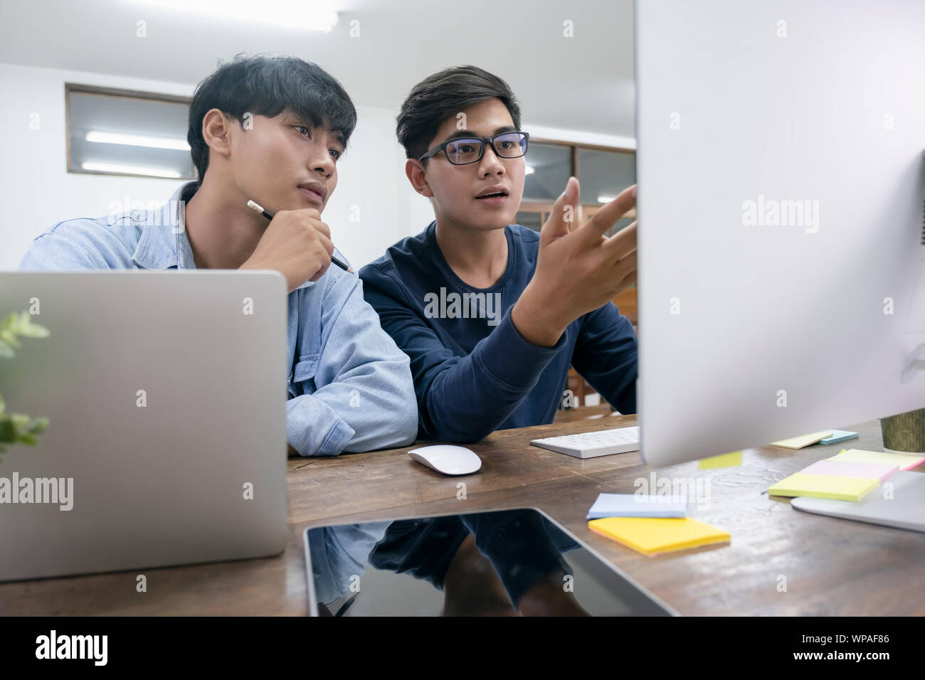 Programmers And Developer Teams Are Coding And Developing Software
