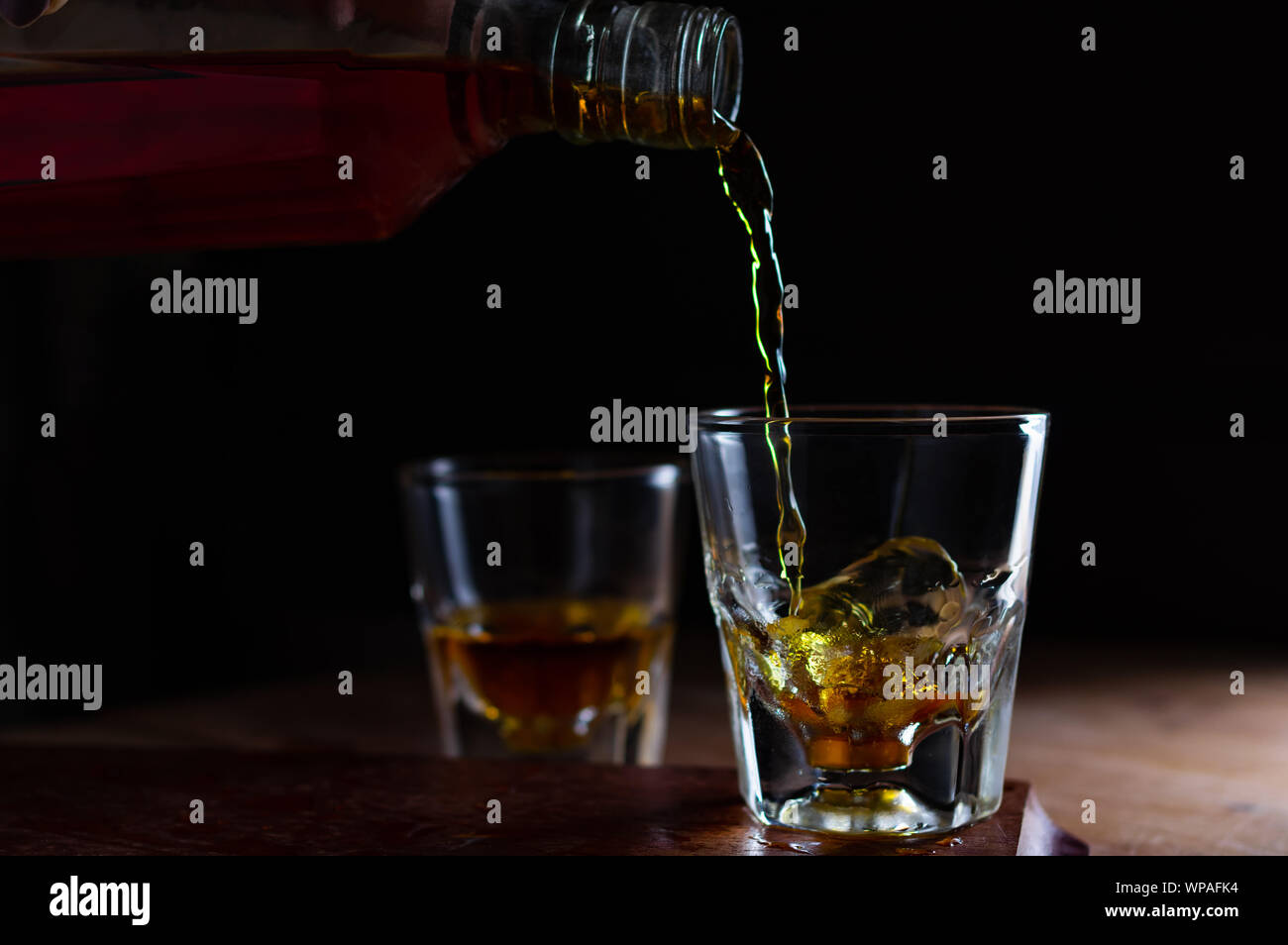 Dark rum pouring hi-res stock photography and images - Alamy