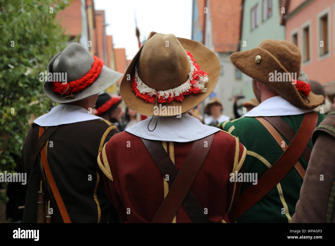 Reconstructors in musketeers clothes on a city holiday Stock Photo - Alamy