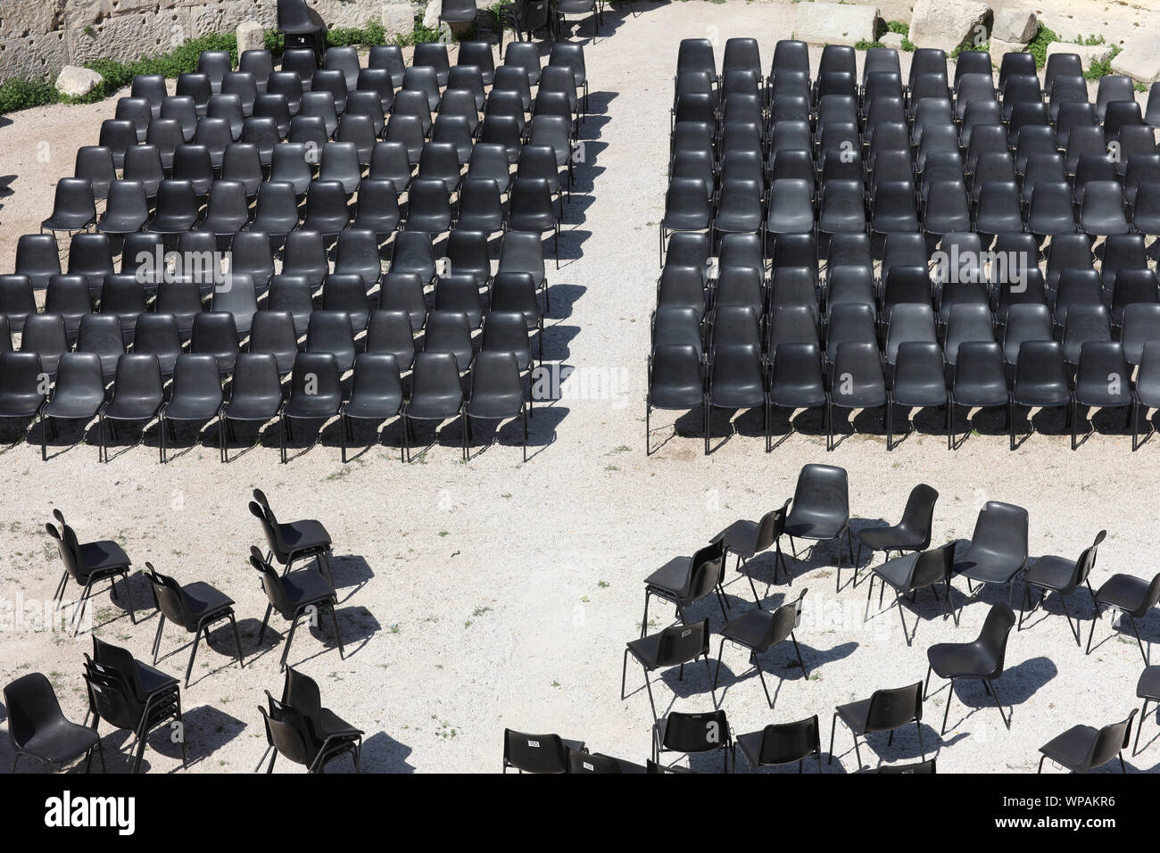 Ancient Roman amphitheater with modern armchairs in the stalls. Lecce ...