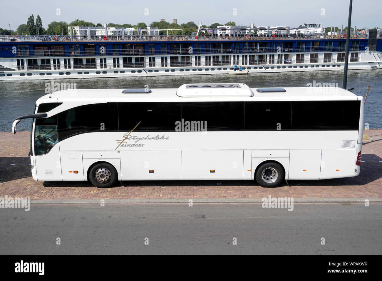 Strychalski coach at Amsterdam river cruise ship pier Stock Photo - Alamy