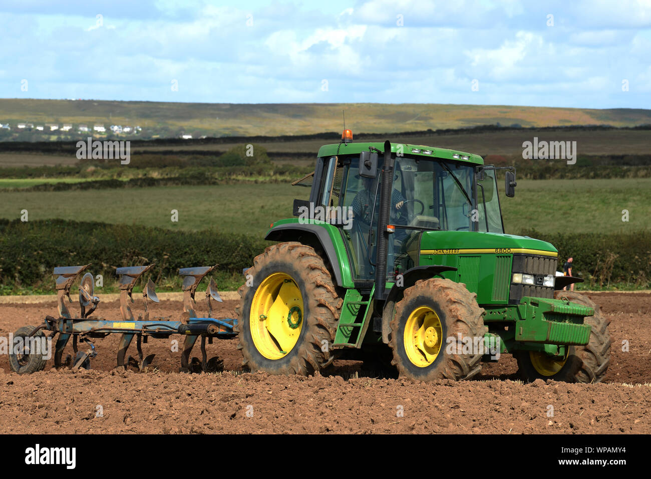 Tractor towing plow in Gower Plowing Match Stock Photo - Alamy