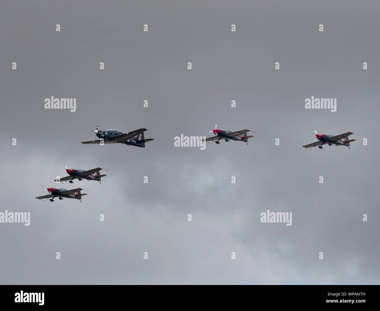 A RAF Tucano flies with The Blades Aerobatic Display Team at the 2019 ...