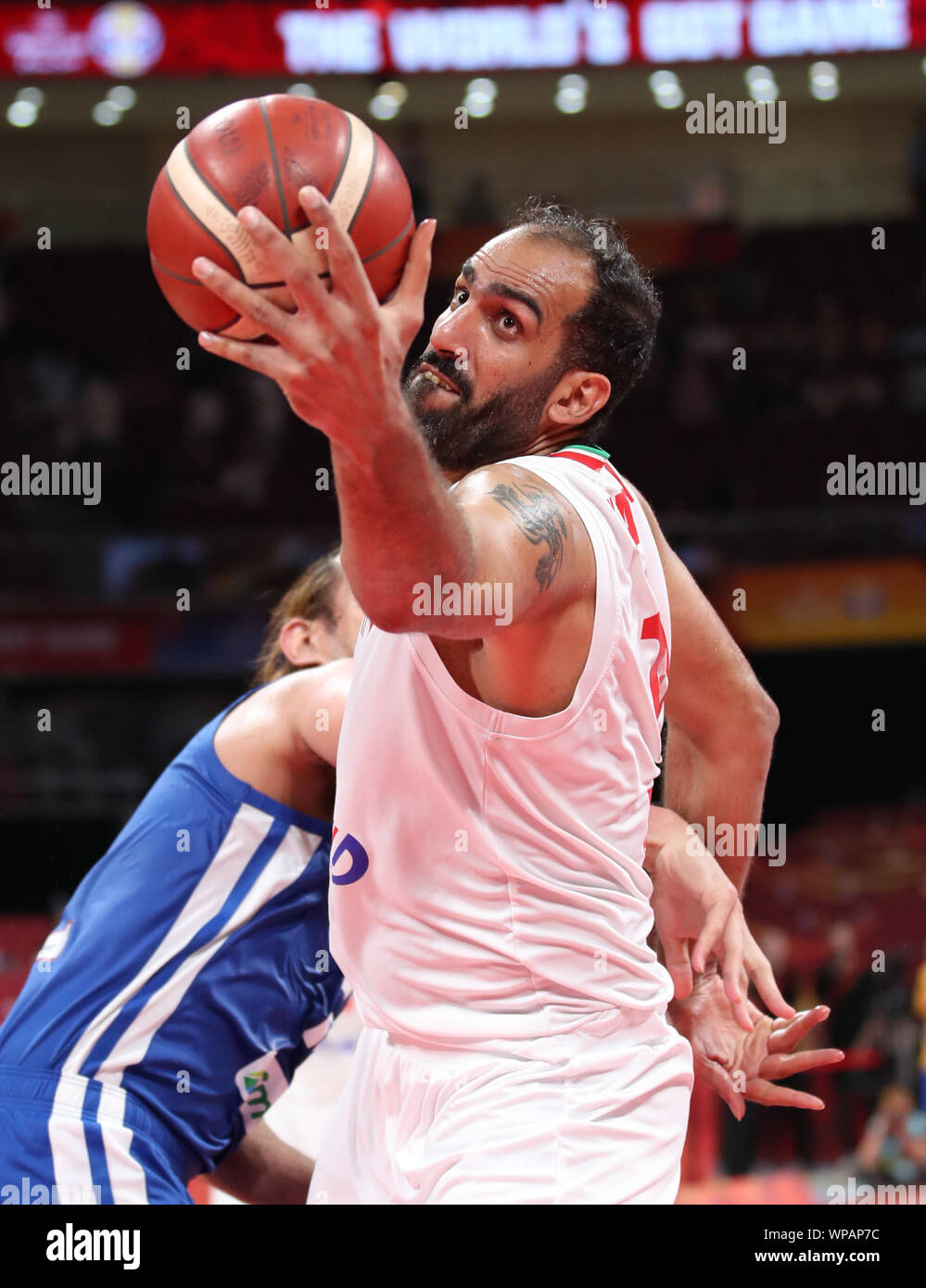 Beijing, China. 8th Sep, 2019. Hamed Haddadi (Front) of Iran fights for ...
