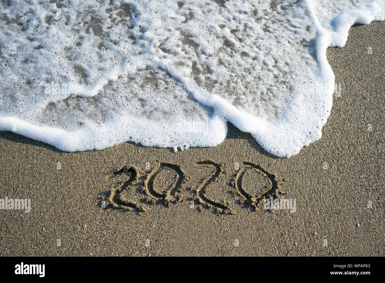 New year 2020 on sandy beach with waves Stock Photo - Alamy