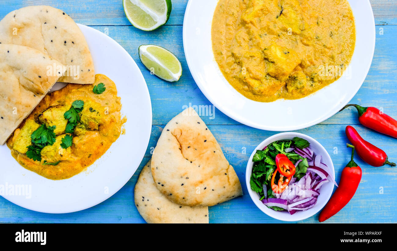 Traditional Indian Chicken Korma Curry Meal With Naan Bread Stock Photo ...