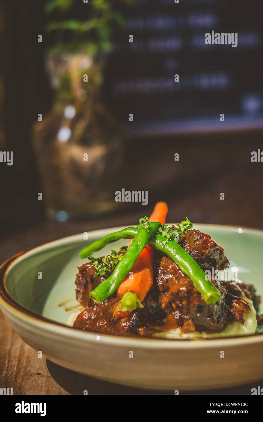 Cheeky Git Braised beef cheek stew with french beans and housemade mash ...