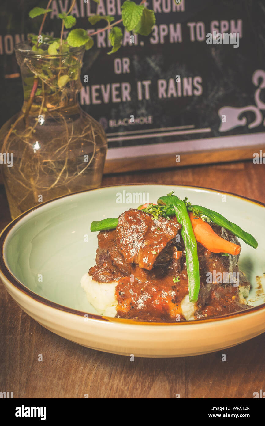 Cheeky Git Braised beef cheek stew with french beans and housemade mash ...