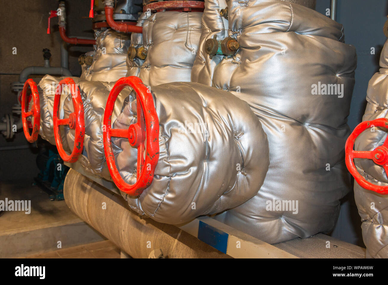 Industrial central heating system with insulation to maintain a high ...