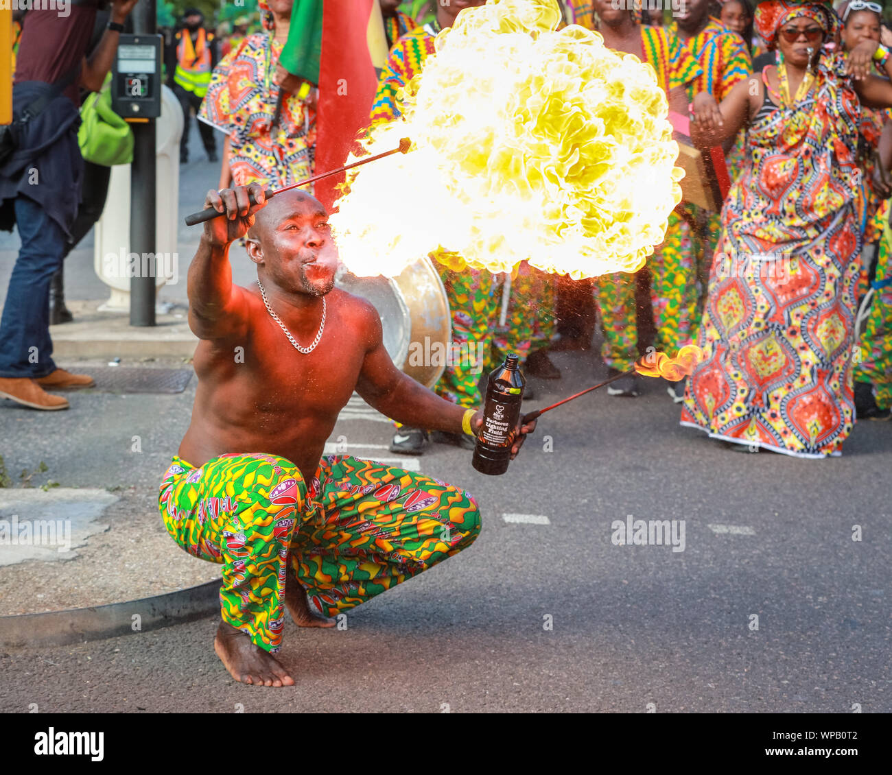 Hackney, London, UK. 08th Sep, 2019. Fire breathing performer ...