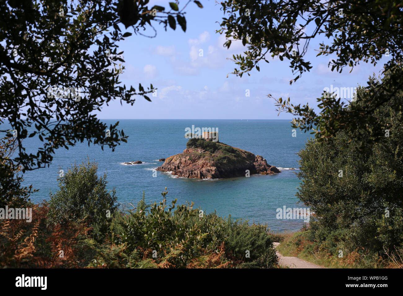 Portelet Tower, on an island off of Portelet Bay, as seen through a ...