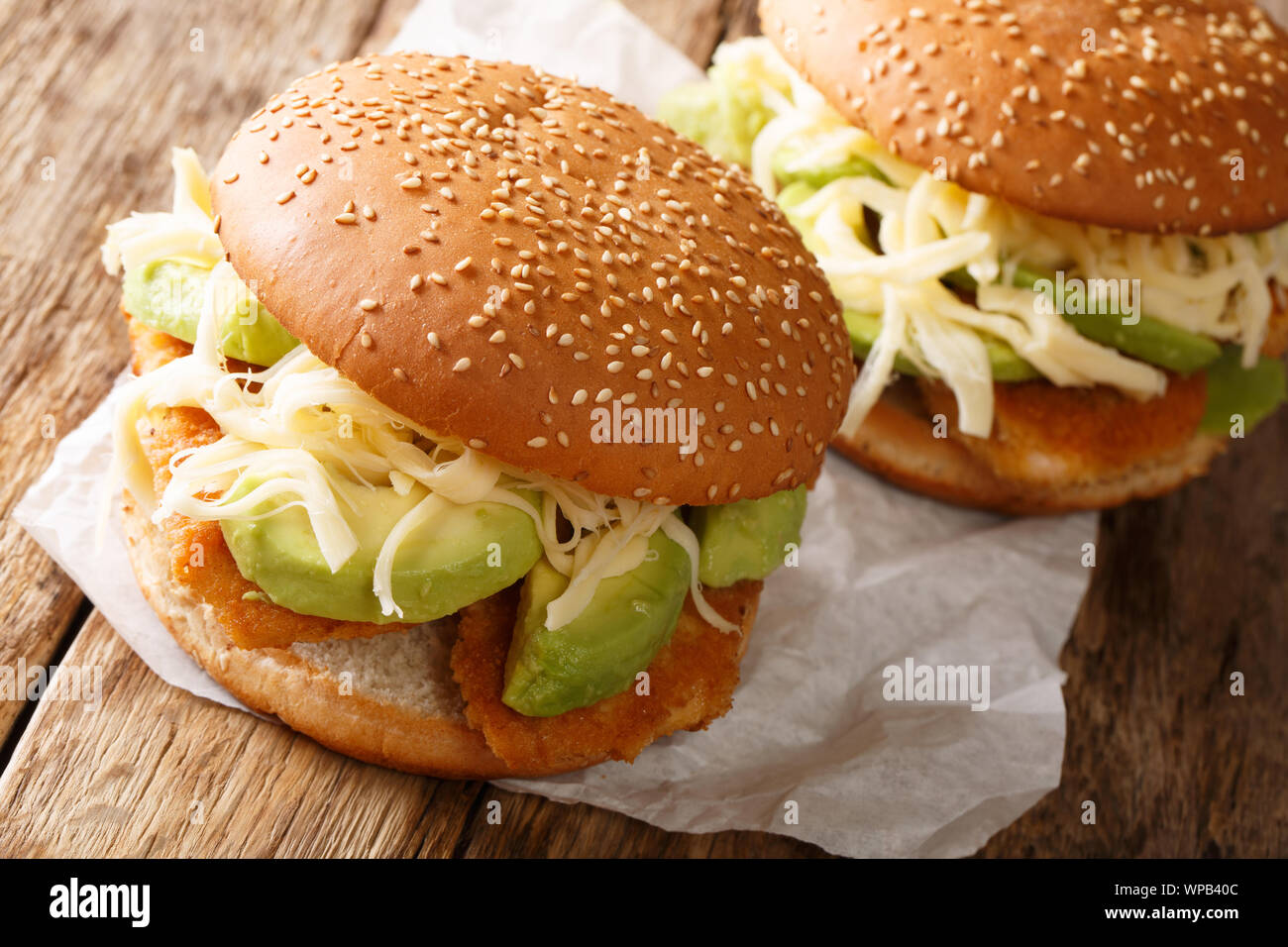 Traditional Mexican Cemita Poblana sandwich with meat, cheese, avocado ...